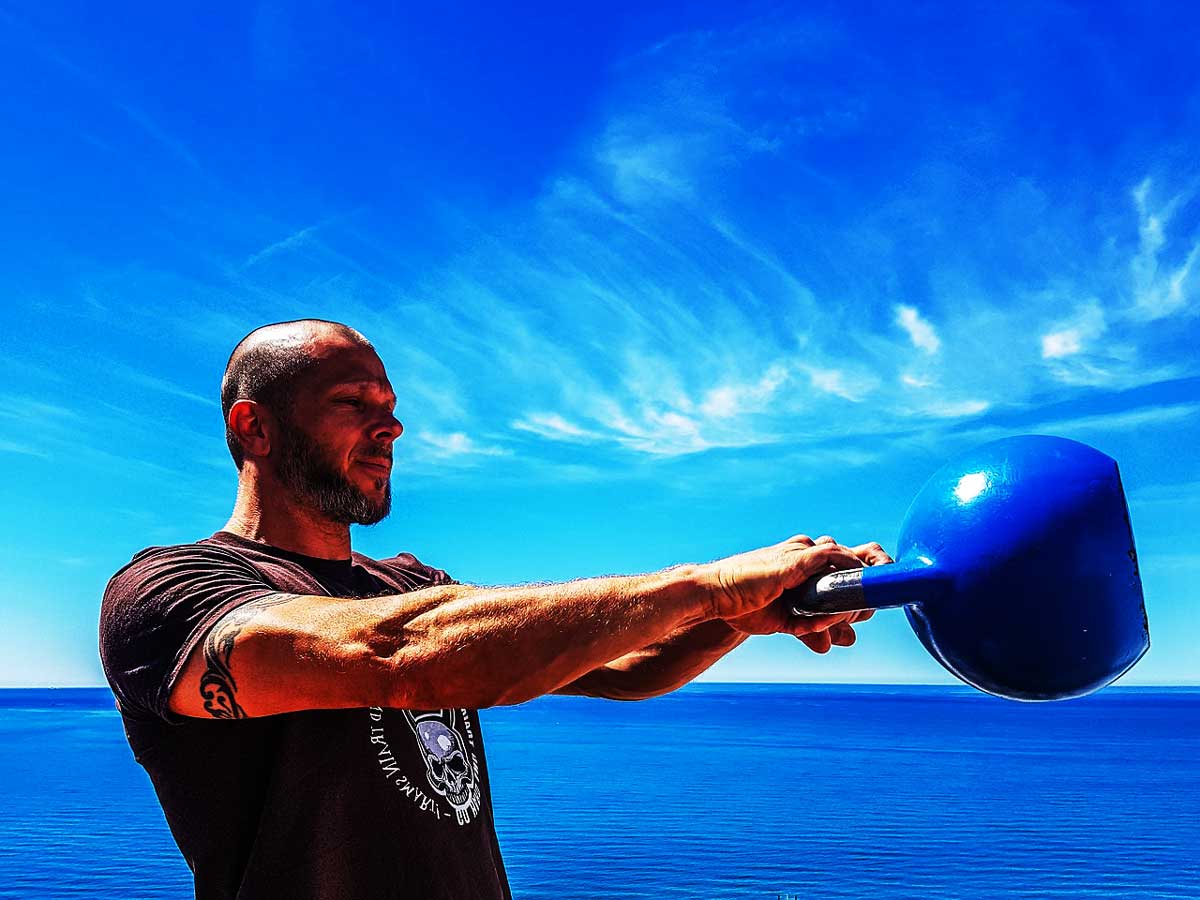 Kettlebell Swing What are the benefits? - The Gym Blog